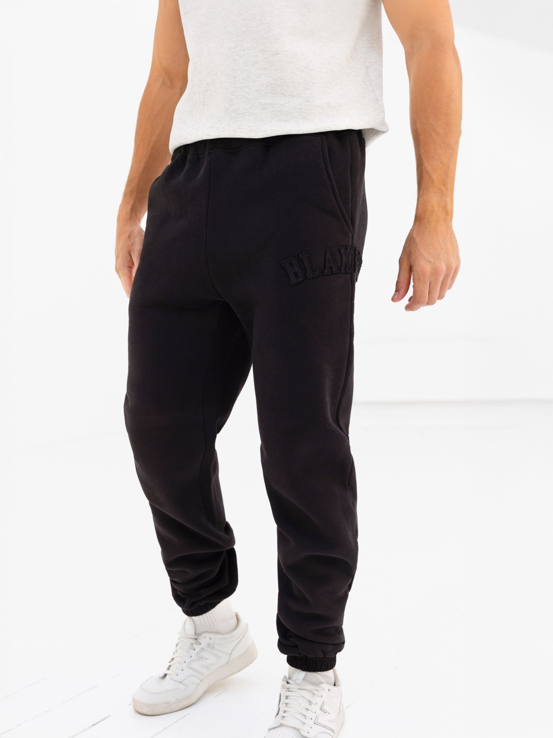 Buy Blakely Black Tonal Varsity Relaxed Sweatpants | Free delivery on ...